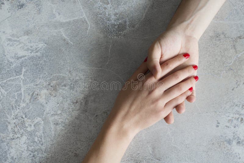 Couple Holding Hands on the Table Stock Photo - Image of care, body ...