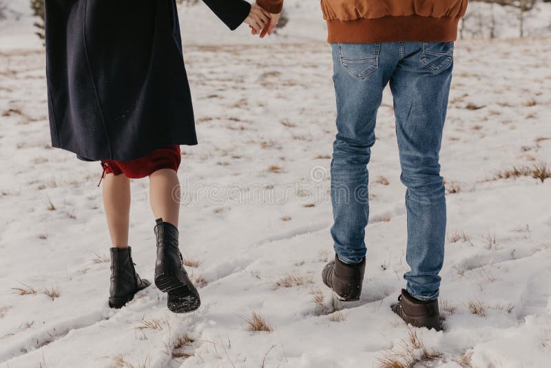 Couple Holding by Hands, Winter Time Stock Image - Image of snowy ...
