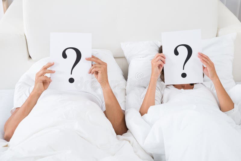 Couple Holding Question Mark Over Faces Stock Image - Image of mark ...