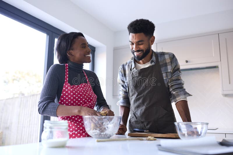 Couple at Home Baking Cake Together in Kitchen Stock Image - Image of ...