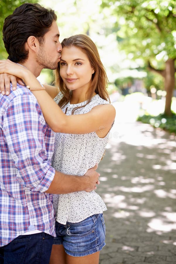 Couple Hug Bonding And Forehead Kiss On Love Date Valentines Day Or