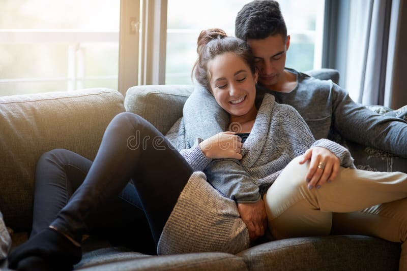 Couple Hug And Couch For Relax And Love Calm And Support In Home For