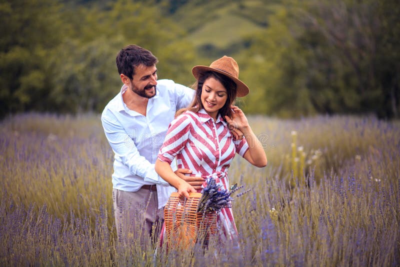 Young Couple in Hug Standing in Lavender Field Stock Image - Image of ...