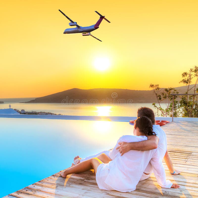 Couple in Hug Watching Airplane at Sunset Stock Photo - Image of family ...