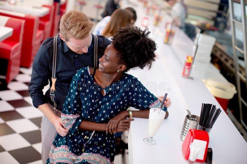 Couple Hugging by the Bar in the Diner Stock Photo - Image of hugging ...