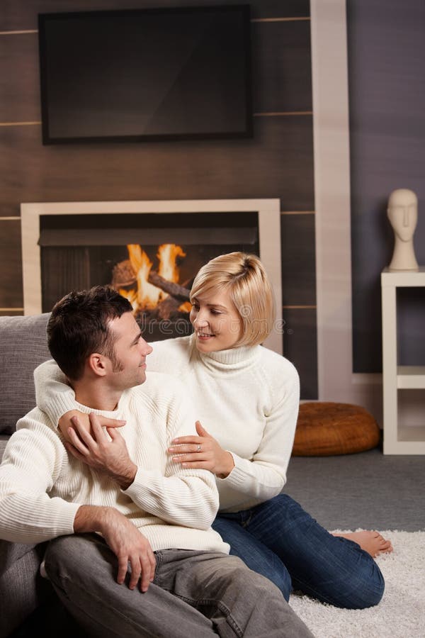 Couple Hugging At Home Stock Images - Image: 27468504