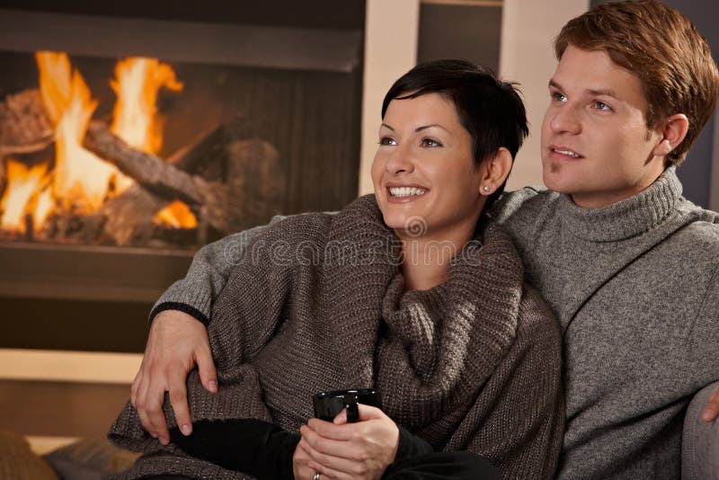 Couple hugging at home stock photo. Image of contemplation - 27468678