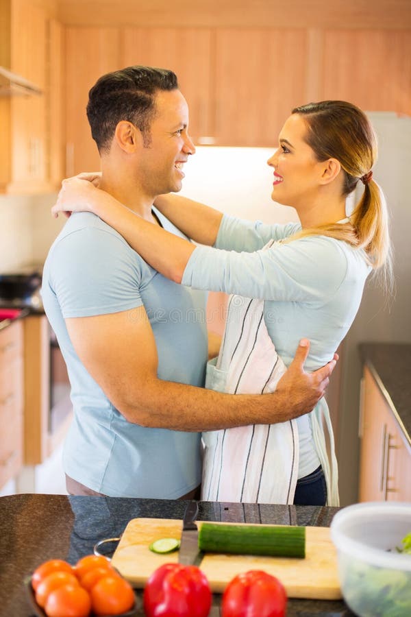 Couple hugging home stock image. Image of couple, chopping - 64150379