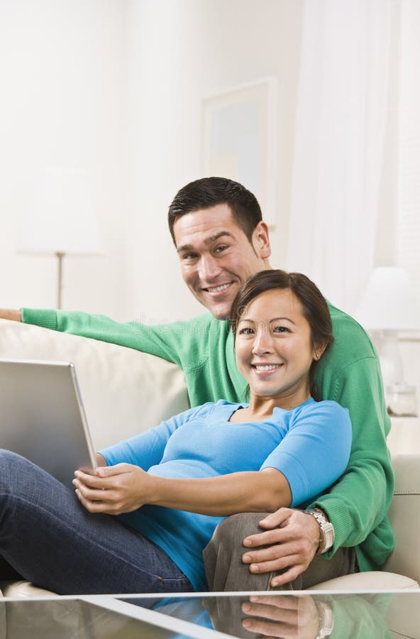 Man with Young Girl in Living Room with Laptop Stock Photo - Image of ...