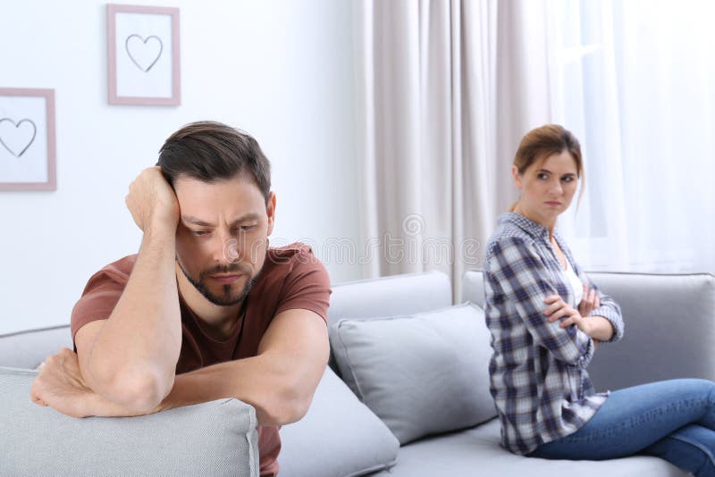 Couple Ignoring Each Other after Argument in Living Room. Stock Image ...