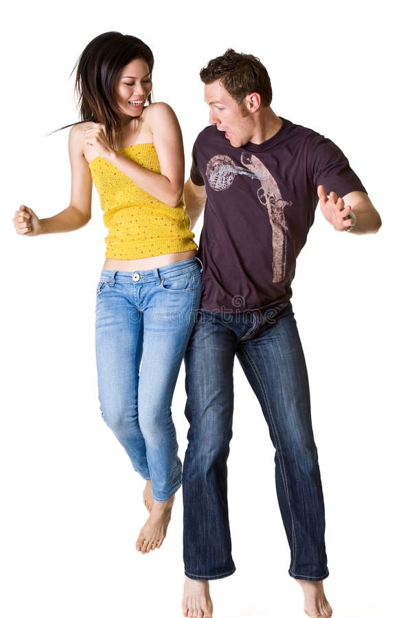 Couple jumping excitedly stock photo. Image of girl, team - 5150788