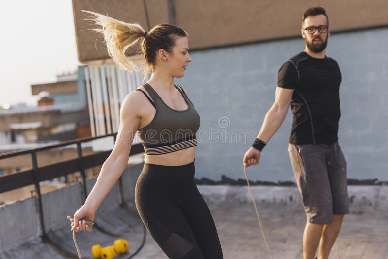 Couple jumping ropes stock photo. Image of holding, beautiful - 139079198