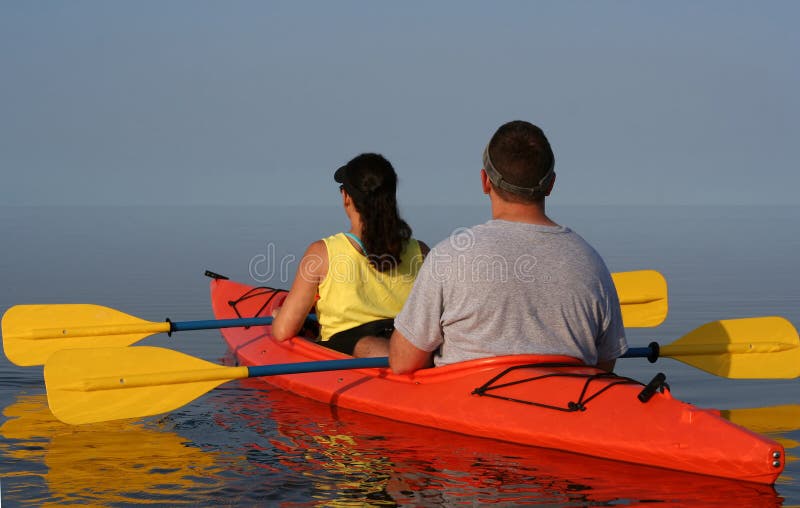 Couple Kayaking stock photo. Image of female, reflection - 1199862