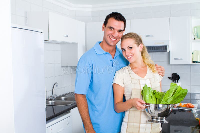 Couple in kitchen stock photo. Image of hugging, life - 12835428