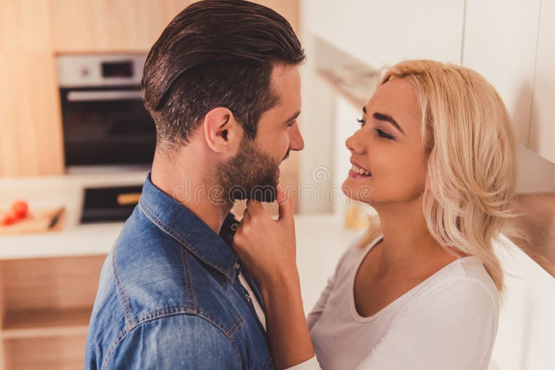 Couple in kitchen stock image. Image of adult, flirt - 89788167