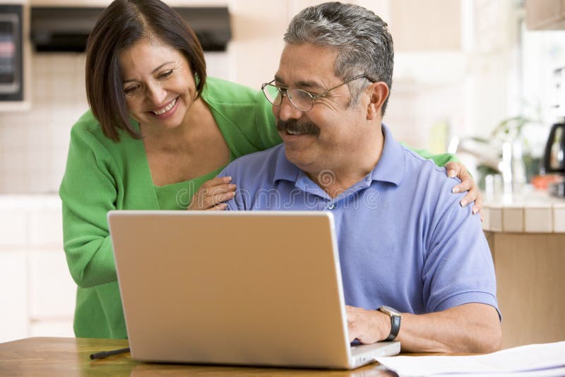 Mature couple bike riding. stock photo. Image of retirement - 5558764
