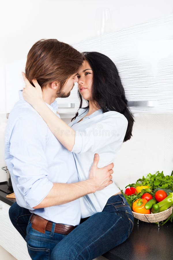 Couple at kitchen stock photo. Image of adult, dinner - 35679894