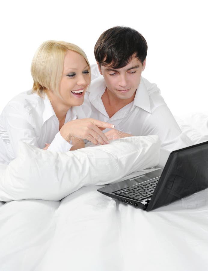 Couple, bedroom laptop stock image. Image of relax, relaxation - 11179949