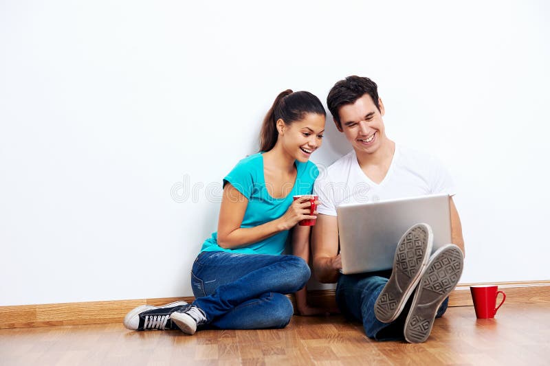 Couple laptop floor stock image. Image of people, happy - 31576753