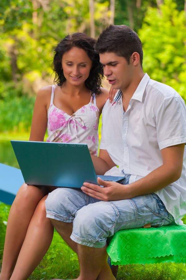 Couple with laptop stock photo. Image of cheerful, connection - 37415798