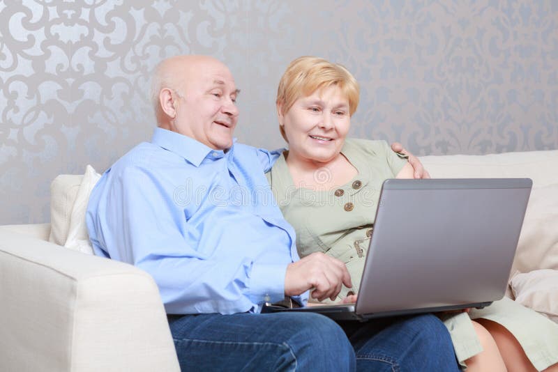 Couple with a Laptop at Home Stock Image - Image of notebook, people ...