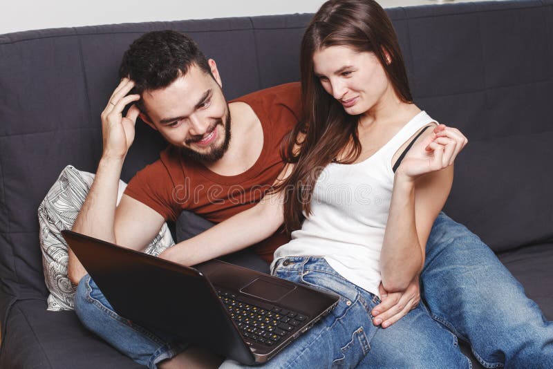 Couple with laptop stock photo. Image of women, leisure - 49140792