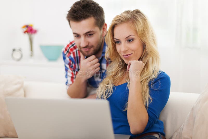 Couple with laptop stock photo. Image of home, romance - 36396524