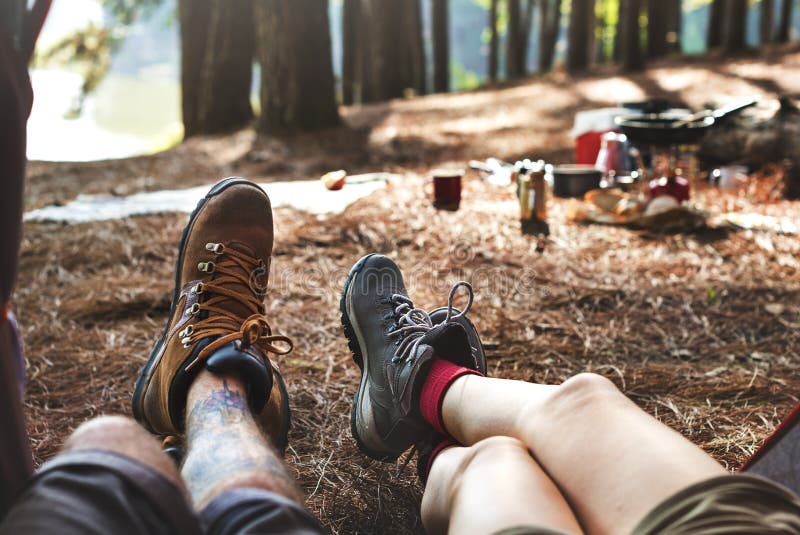 Couple Legs Relaxing Camping Outdoors Concept Stock Photo - Image of ...