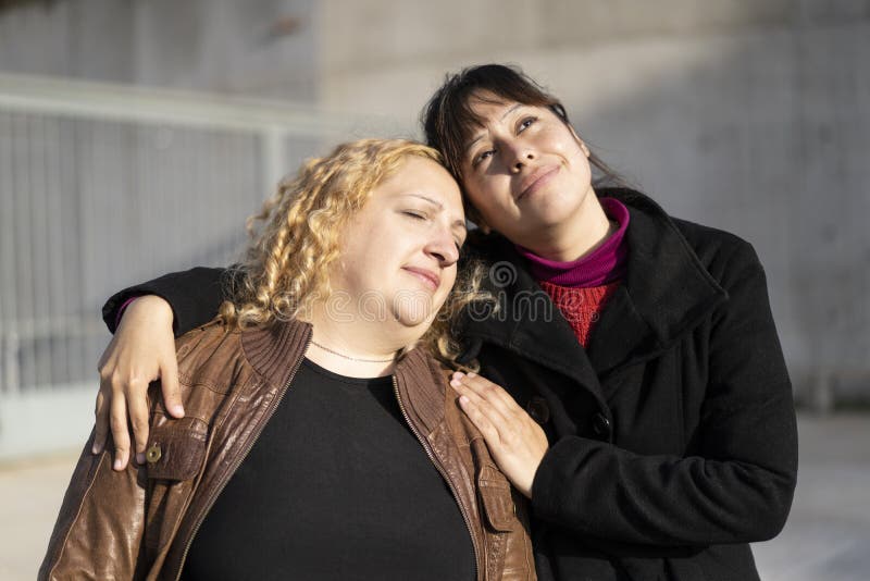 Couple Of Lesbian Women Hugging In A Park Stock Image Image Of