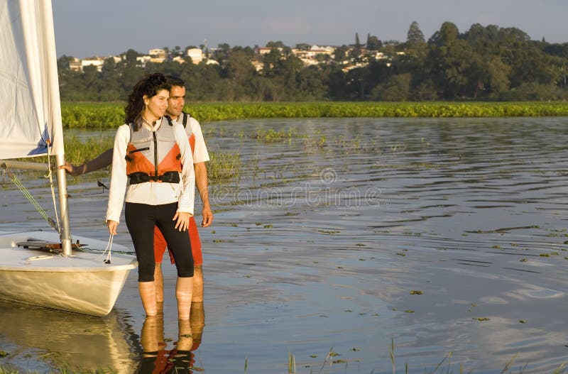 Couple Looking Across Lake - Horizontal Picture. Image: 5899488