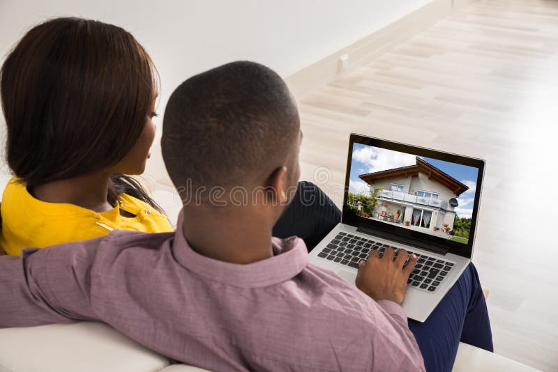 Couple looking at house stock image. Image of mortgage - 40191587