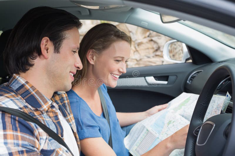 Couple looking at the map stock image. Image of reading - 50491725
