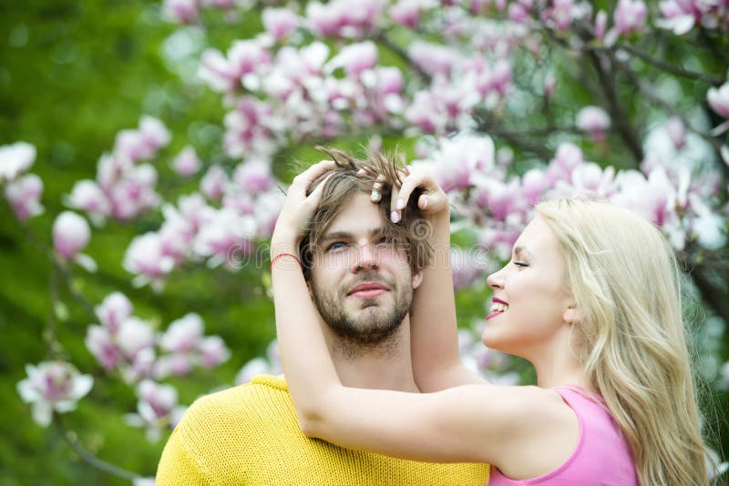 Couple in Love in Blossoming Flower, Spring. Stock Photo - Image of ...