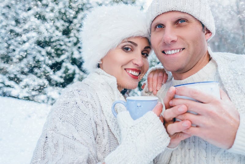 Couple in Love with Cups of Hot Tea in Snow Winter Forest Stock Image ...