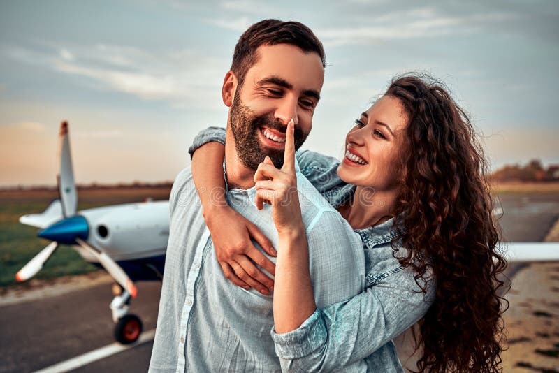 Couple in Love Having Fun Near Private Plane Stock Image - Image of ...