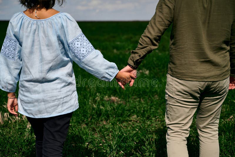 Couple love holding hands stock photo. Image of adult - 262245670