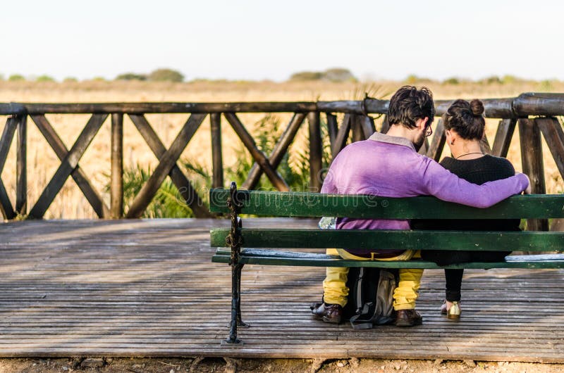 A Couple in Love Hugging on a Bench Stock Image - Image of feelings ...