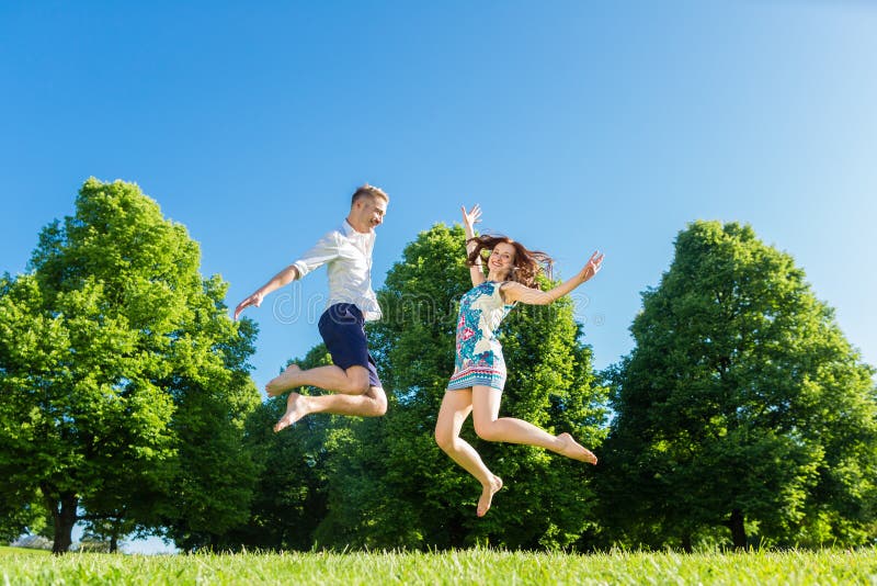 Couple in Love Jumping on Park Stock Image - Image of people, jump ...