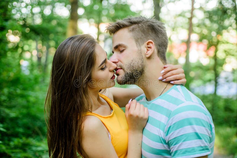 Couple In Love Kissing With Passion Outdoors Man And Woman Attractive