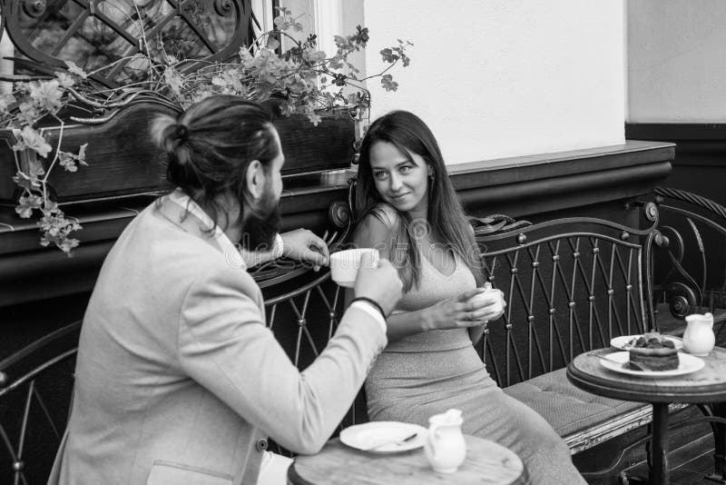 Couple In Love Of Man And Woman Meet In Cafe Outdoor Drink Coffee