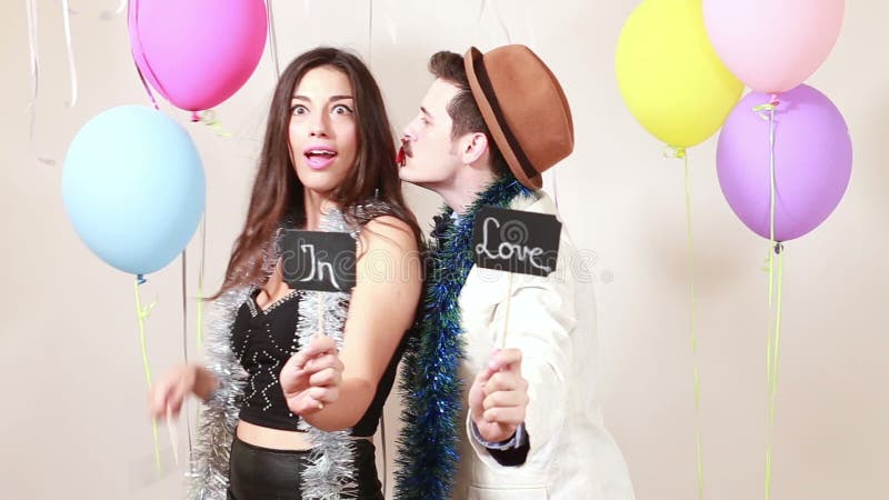 Couple in Love in Photo Booth Stock Video - Video of positive ...