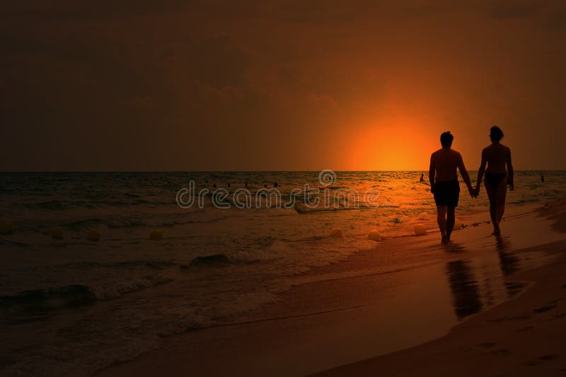 Couple in love at sunset stock photo. Image of beach - 11221670
