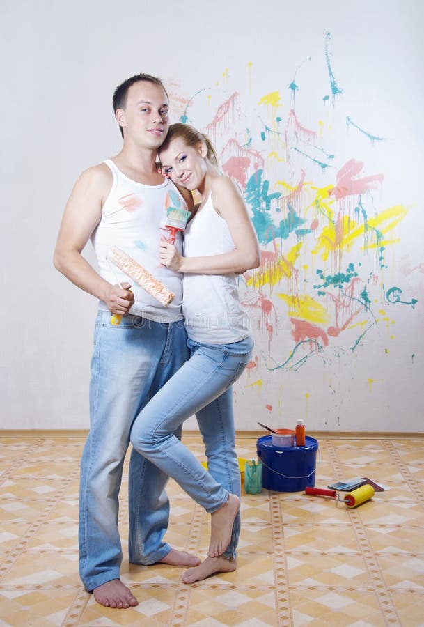 Couple make repairs stock image. Image of cheerful, female - 27484413