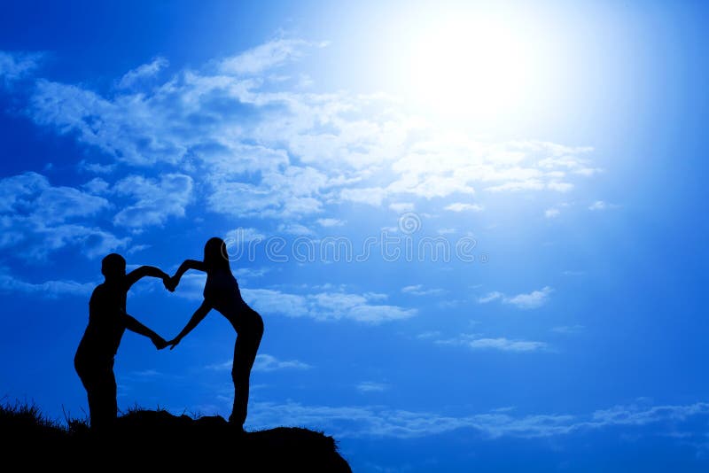 Couple Making Heart Shape with Arms Stock Image - Image of place ...