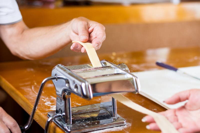 Couple Making Homemade Pasta at Home Stock Photo - Image of cooking ...