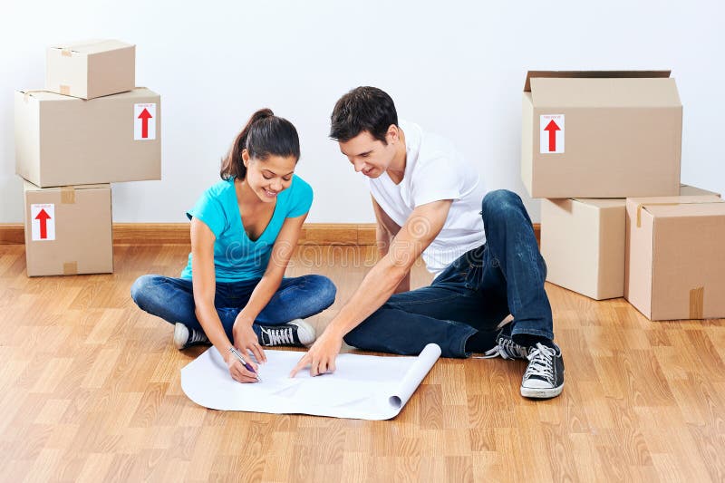 Couple making plans stock image. Image of cardboard, husband - 31576775