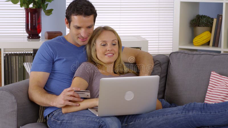 Couple Making a Purchase Online with Laptop Stock Image - Image of ...