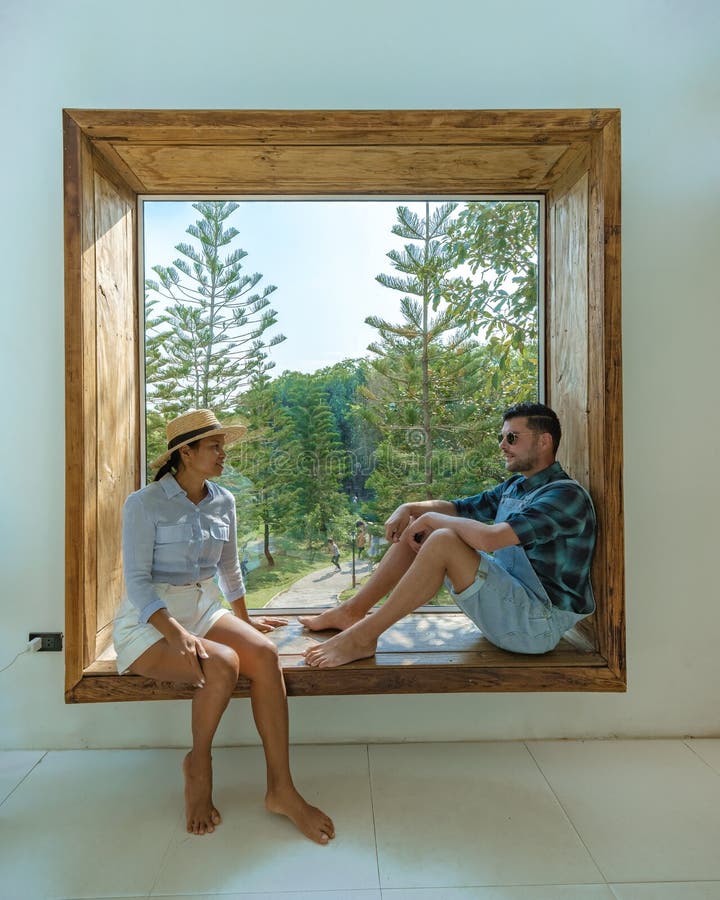 Couple Man And Woman Relaxing In A Cafe In Thailand Chiang Mai Stock