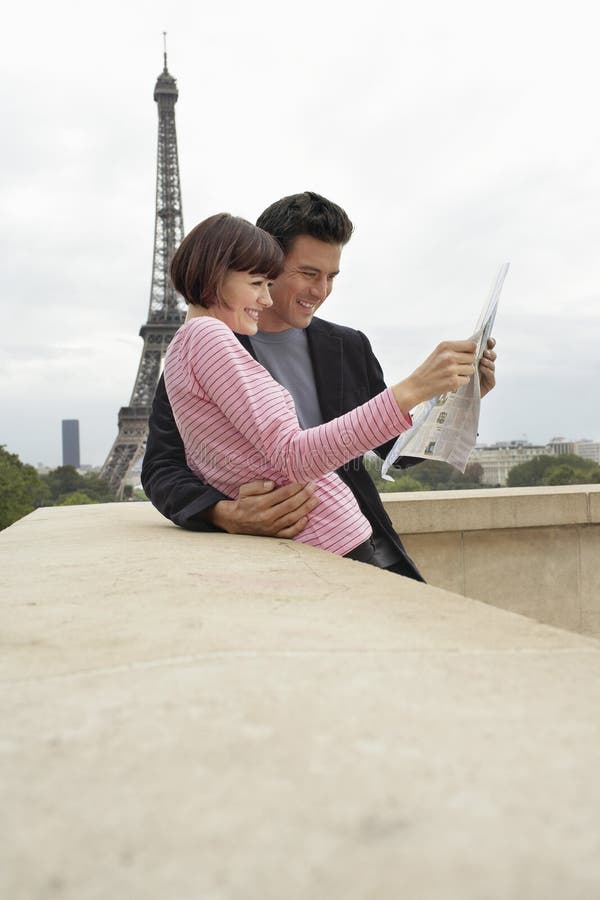 Woman Reading Book in Front of Eiffel Tower Stock Image - Image of ...