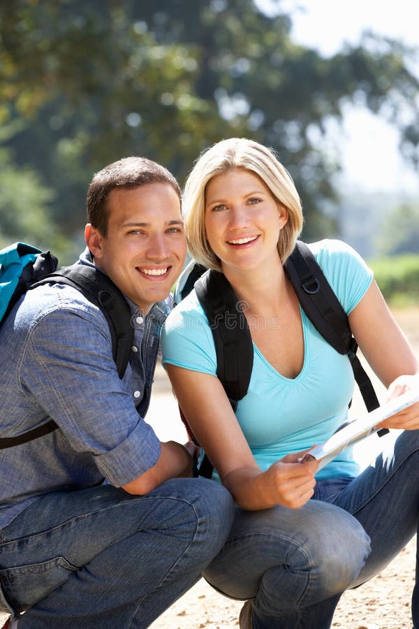 Couple with Map on Country Walk Stock Image - Image of countryside ...